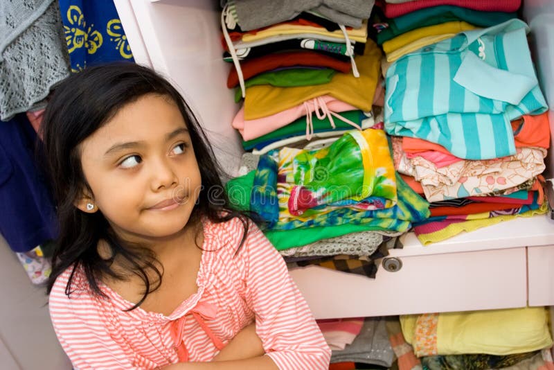 Little Girl and Her Clothing Collection Stock Image - Image of fashion ...