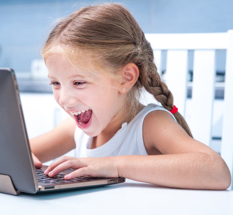 Little girl with laptop stock image. Image of little - 21669545