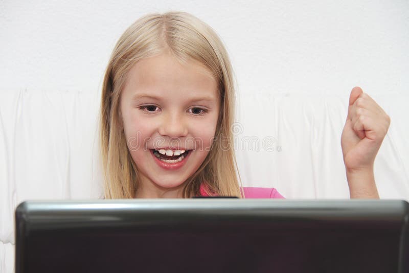 Little Girl with Her Computer at Home at the Table Stock Image - Image ...