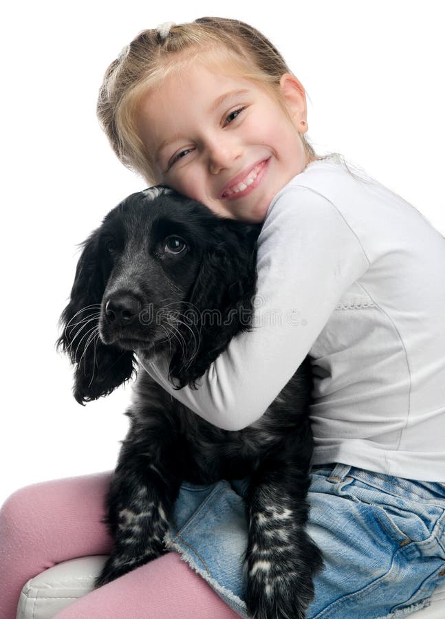 Little girl with her puppy stock image. Image of loving - 28740265