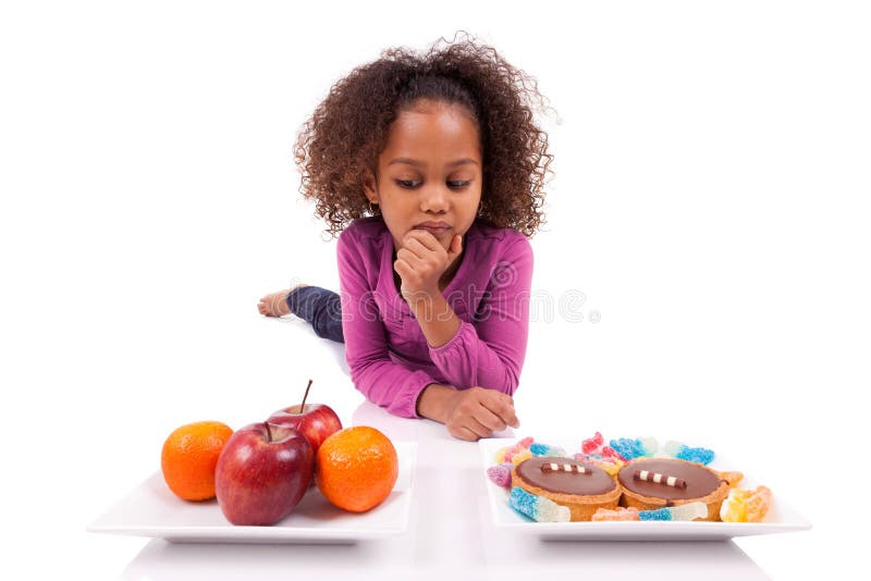 Little Girl Hesitating between Fruits or Candy Stock Photo - Image of ...