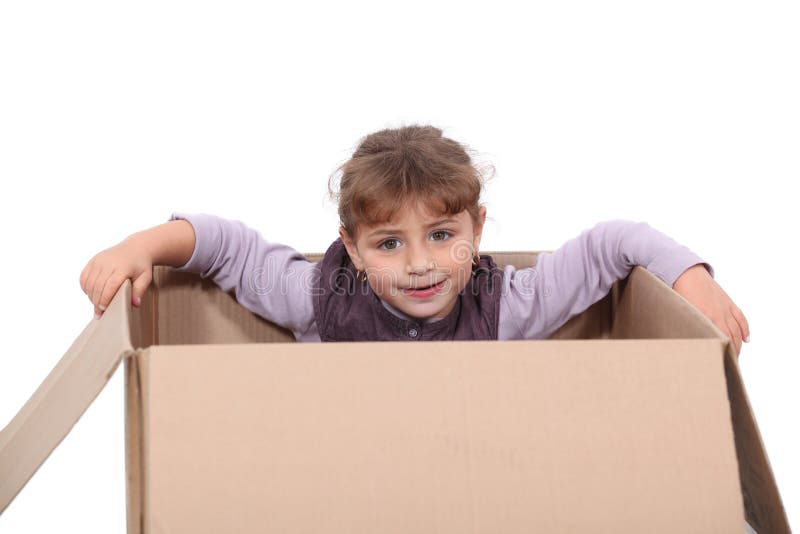 Little Girl Hiding in a Box Stock Image - Image of brown, hide: 33679575