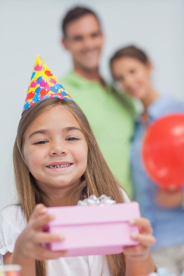 Little Girl Holding a Birthday Present Stock Photo - Image of birthday ...