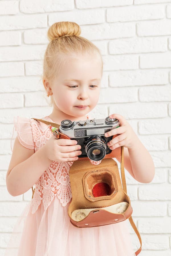 Little Girl with Retro Camera Stock Image - Image of face, white: 70005003