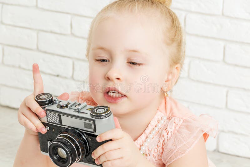 Little Girl with Retro Camera Stock Image - Image of face, white: 70005003