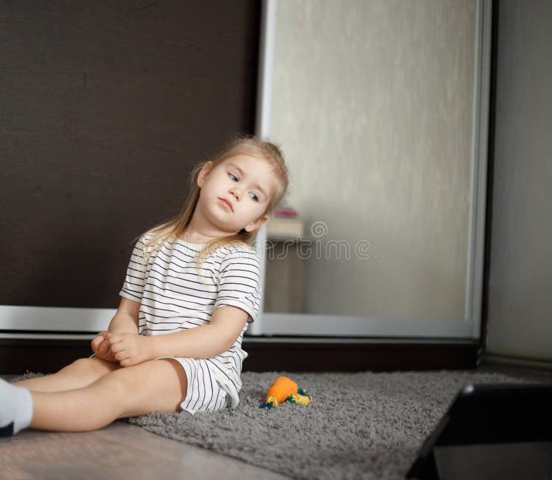 Little Girl at Home Watching Tablet Computer. Home Schooling, Distance ...