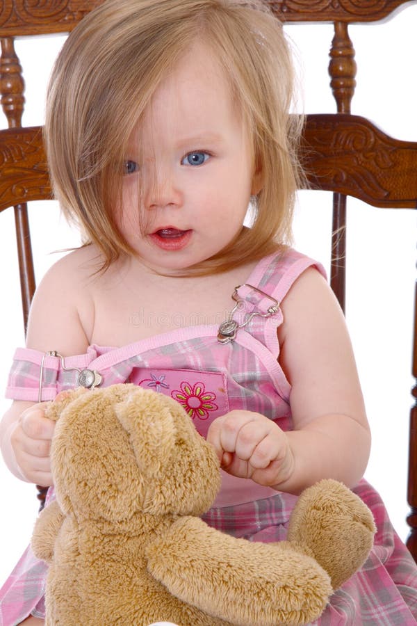 Little girl huging a bear stock photo. Image of little - 17769952