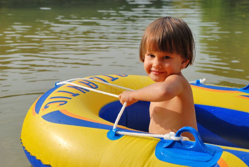Little Girl in an Inflatable Boat Stock Image - Image of daughter, hope ...