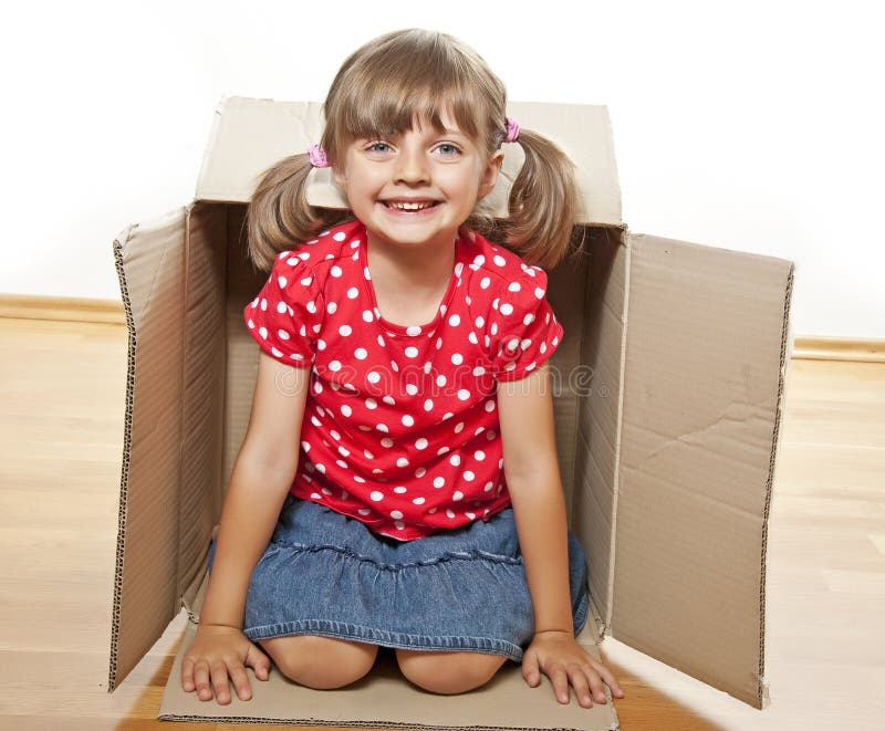 Little girl inside a box stock photo. Image of flat, family - 25670446