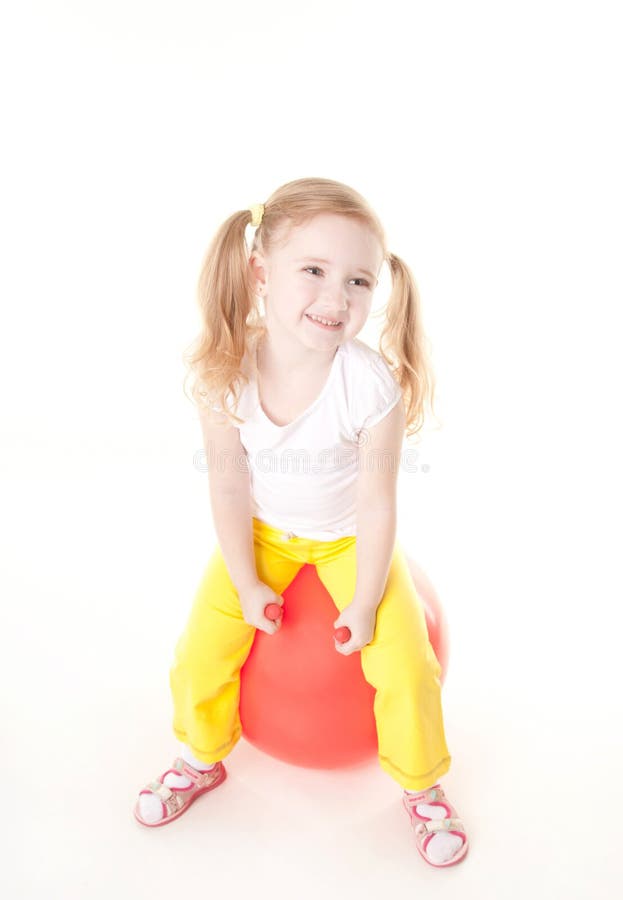 Little Girl Jumping on Gymnastic Ball Stock Photo - Image of happiness ...