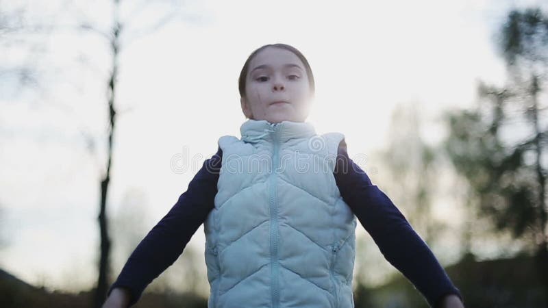Little Girl Jumping Rope at Sunset. Slow Motion Stock Video - Video of ...