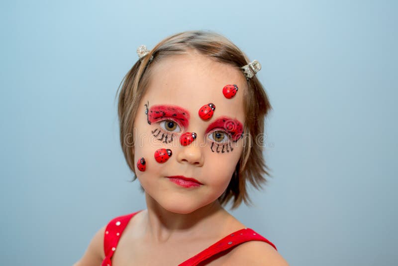 Little Girl with Ladybug Face Paint Stock Photo - Image of beautiful ...