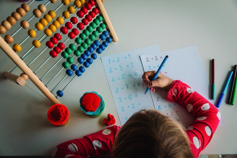 Little Girl Learning Numbers and Counting, Kid Doing Homework Stock ...