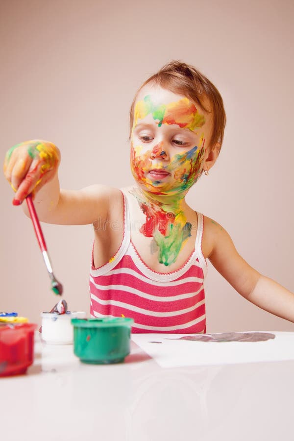 Little Girl Learning To Paint Child Development in Art Stock Photo ...