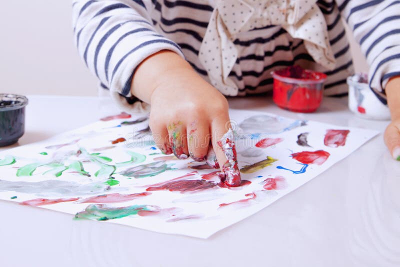 Little Girl Learning To Paint Child Development in Art Stock Photo ...