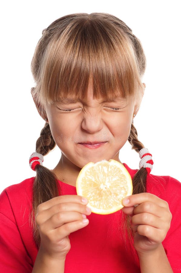 Little girl with lemon stock photo. Image of citrus, acid - 26800214
