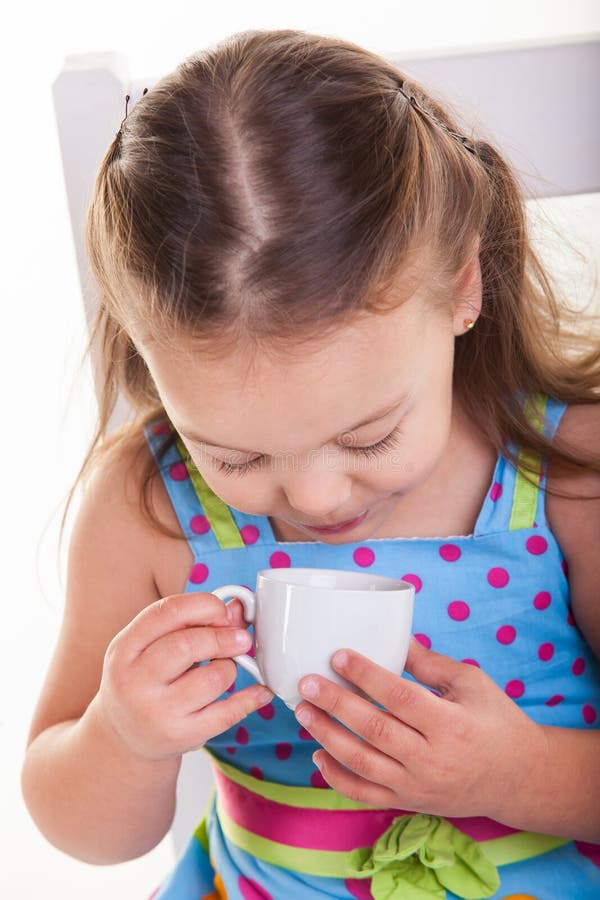Little Girl Look into the Cup. Stock Photo - Image of funny, background ...