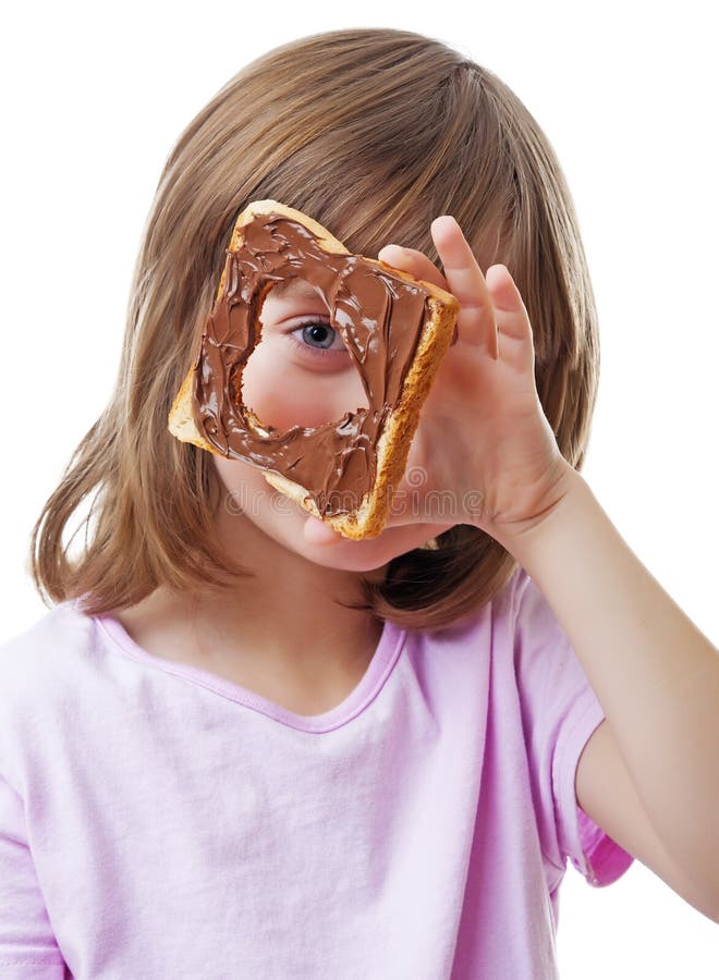 Little Girl Looking through a Bread with Chocolate Butter Stock Photo ...