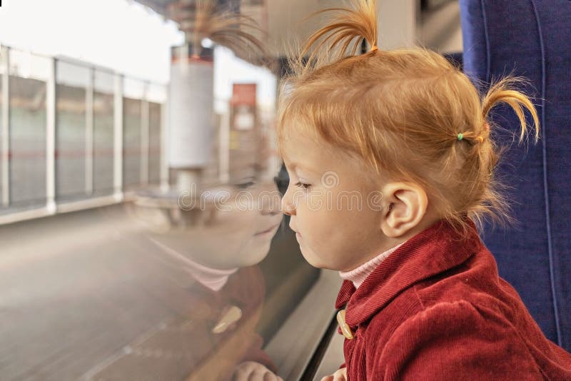 Little Girl Looking Out Train Window Stock Photos - Free & Royalty-Free ...