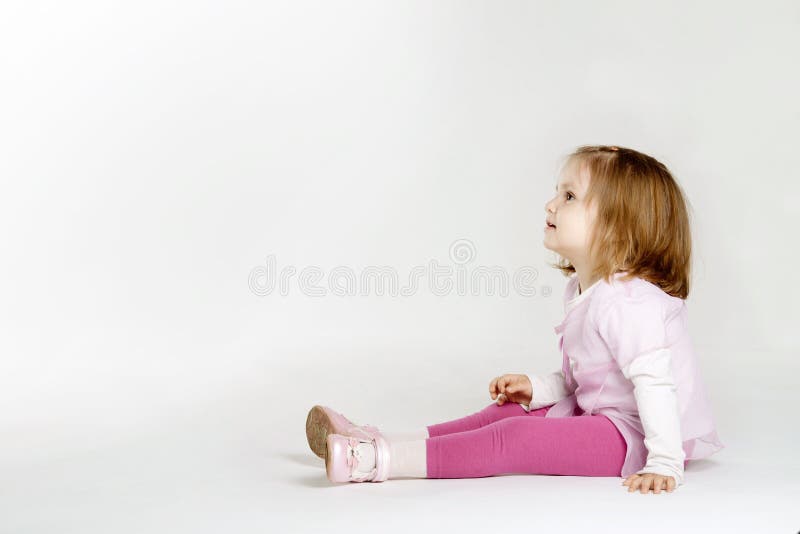 Little girl looking up stock image. Image of mouth, beauty - 17654979