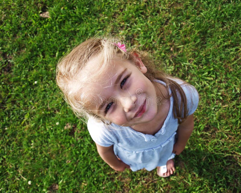 Little girl looking up stock photo. Image of camera, cheerful - 35485194