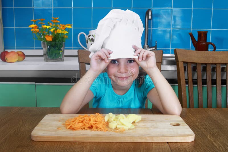 Little Girl Looks Out from Under Chef Hat Stock Photo - Image of ...