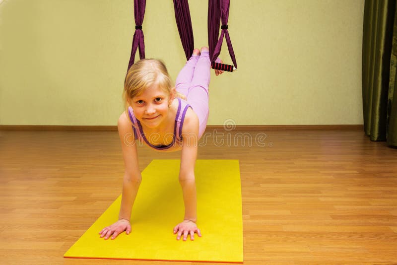 Little Girl Making Aerial Yoga Exercises, Indoor Stock Image - Image of ... Little Girl Making Aerial Yoga Exercises, Indoor Stock Image - Image of ...