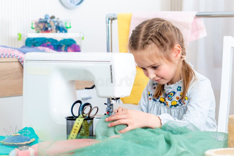Little Girl Making Crafts at Sewing Machine Stock Image - Image of ...