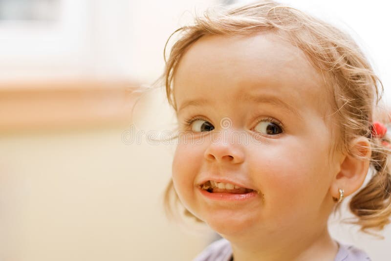 Little girl making faces stock photo. Image of delicious - 5143616