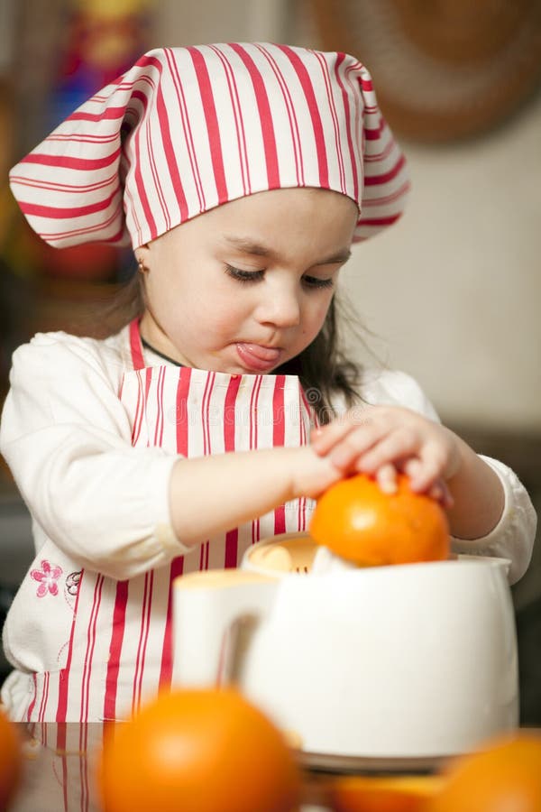 Little Girl Making Fresh Juice Stock Image - Image of extractor, drink ...