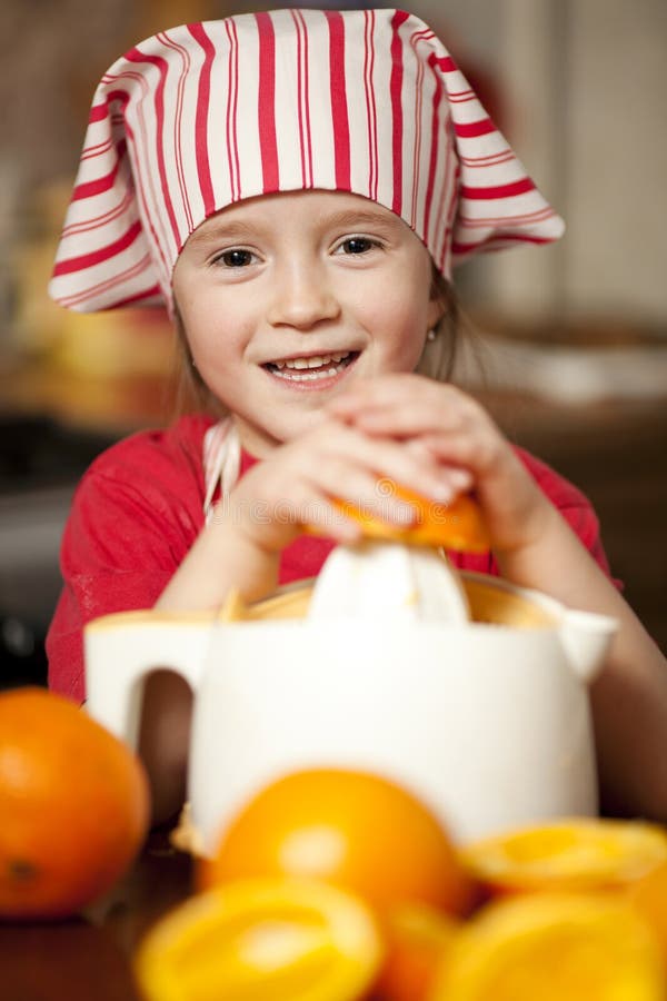 Little Girl Making Fresh Juice Stock Image - Image of appliance, girl ...