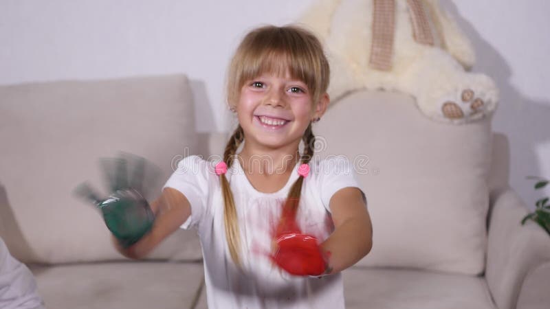 Little Girl Making Hand-prints with Paint Stock Footage - Video of ...