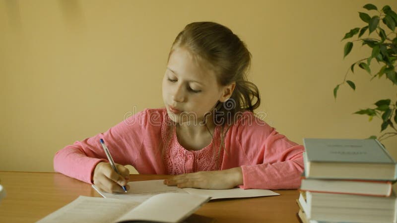 Making Homework Time a Happy Time. 4k Video Footage of a Mother Helping ...