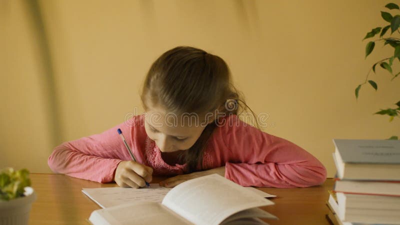 Making Homework Time a Happy Time. 4k Video Footage of a Mother Helping ...