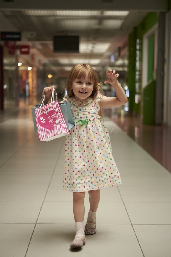 Little girl in the mall stock image. Image of customer - 76799503