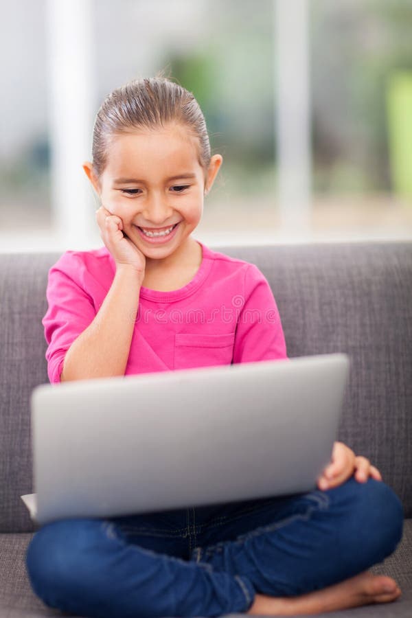Child with computer stock image. Image of entertainment - 14003831