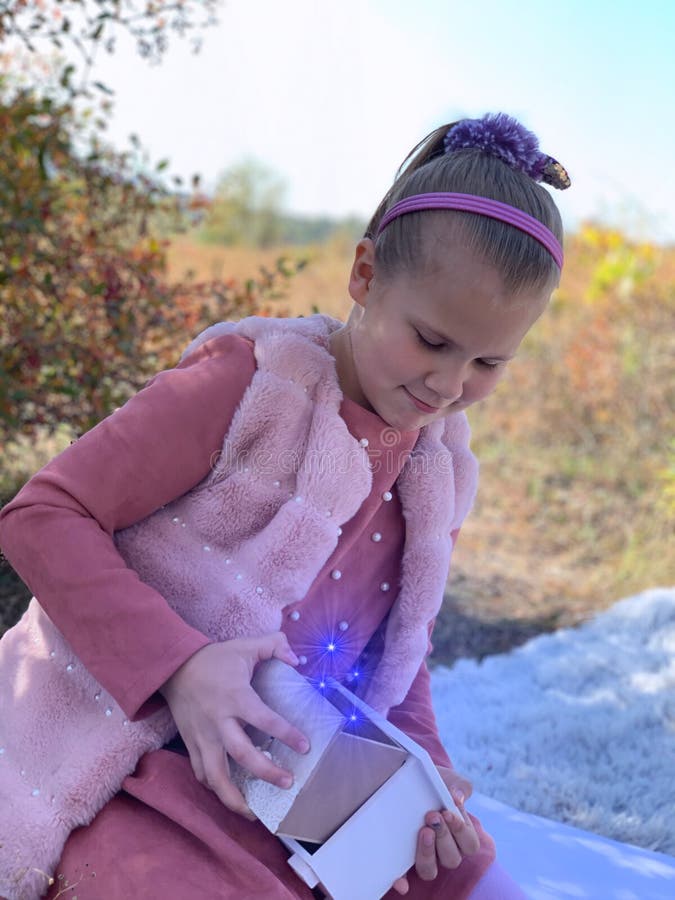 A Little Girl Opens a Magic Box Stock Image - Image of magical ...