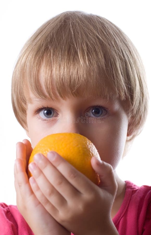 Little girl with orange stock photo. Image of cheerful - 10568452