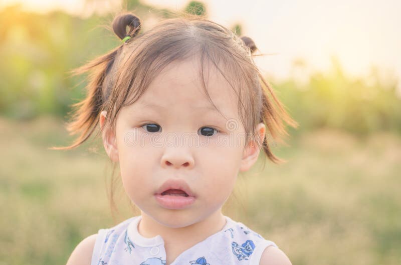 Little girl outdoor stock image. Image of grass, person - 68302047