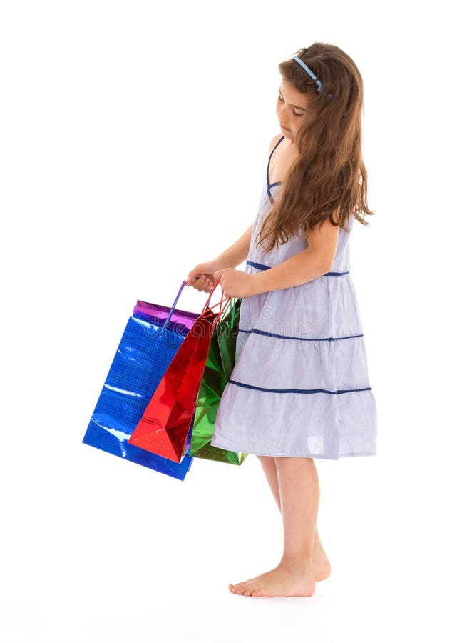 Little girl with packages stock photo. Image of beauty - 40796880