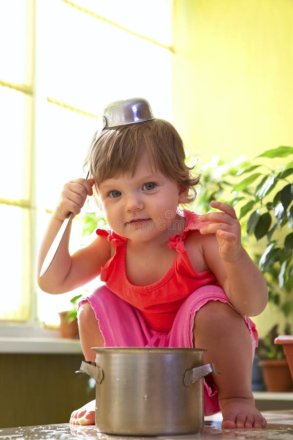 Little Girl Pan Ladle Her Head Stock Photos - Free & Royalty-Free Stock ...