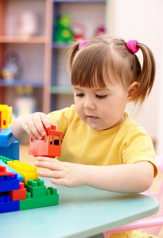 Little Girl Play with Building Bricks in Preschool Stock Photo - Image ...