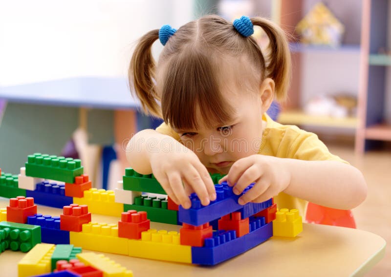 Little Girl Play with Building Bricks in Preschool Stock Photo - Image ...