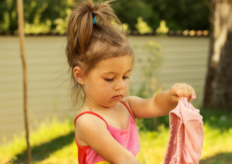 Little Girl Play Changes Clothes Stock Photos - Free & Royalty-Free ...