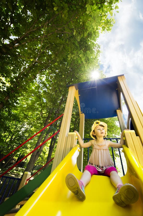 Girl on Slide stock image. Image of amusement, outdoors - 57032895
