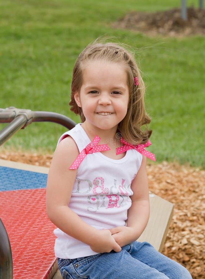 Little Girl Playing stock image. Image of playground - 13670451
