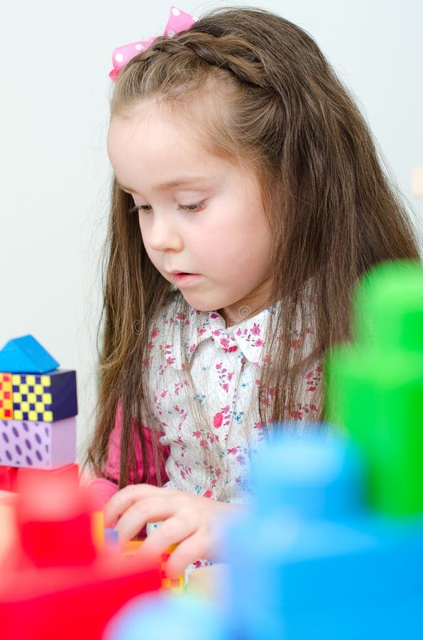 Little girl playing stock photo. Image of motility, play - 29498554