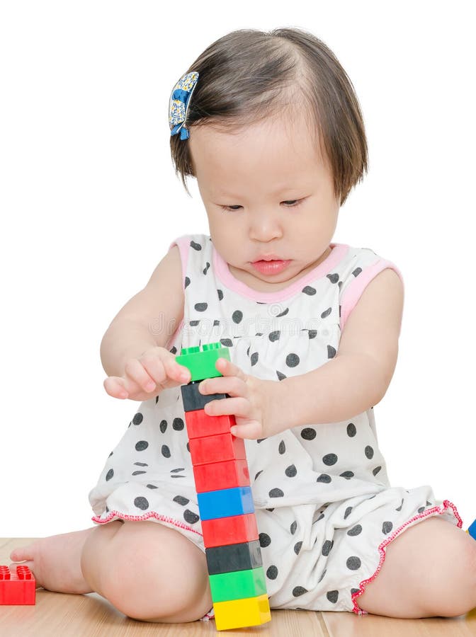 Little girl playing blocks stock image. Image of game - 54118889