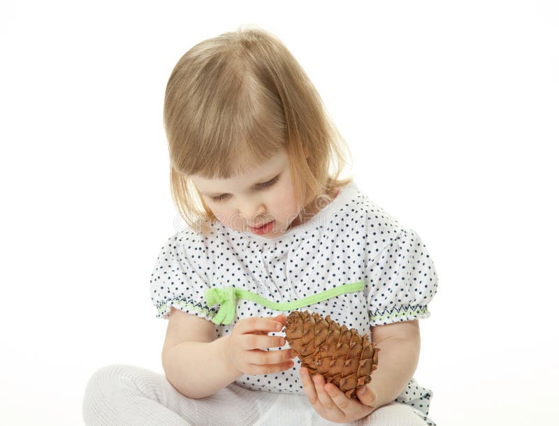 Little Girl Playing Cedar Cone Stock Photos - Free & Royalty-Free Stock ...