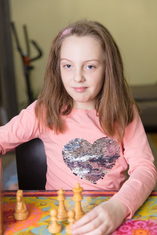 Little girl playing chess stock photo. Image of chess - 245489508